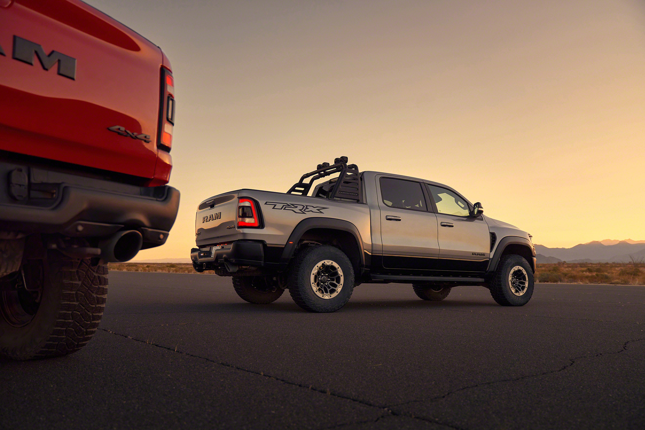 2021 Ram 1500 TRX group shot rear 3/4 - The Fast Lane Truck