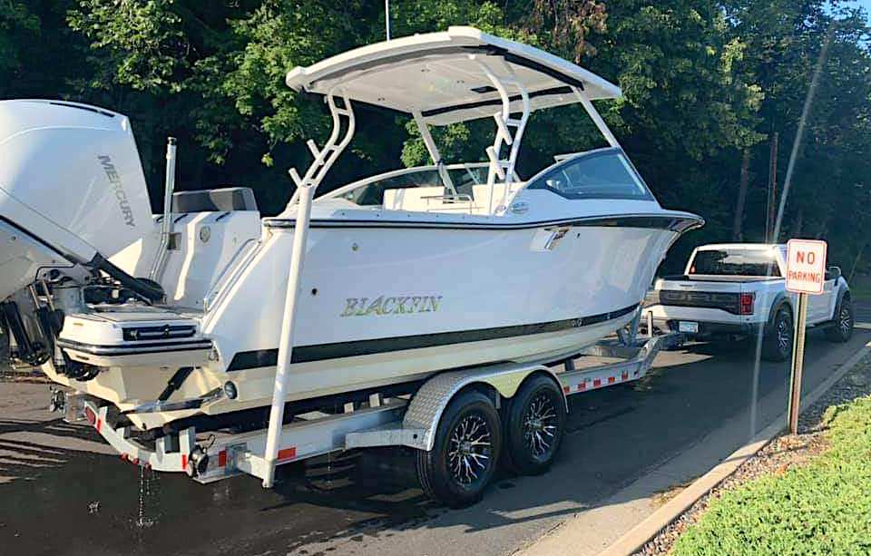 ford-raptor-towing-boat - The Fast Lane Truck