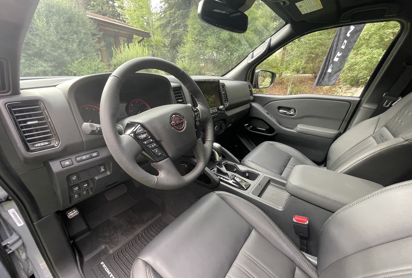 2022-nissan-frontier-front-seat - The Fast Lane Truck